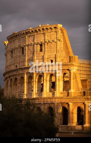 The Roman Coliseum illuminated by the sunset sun Stock Photo - Alamy
