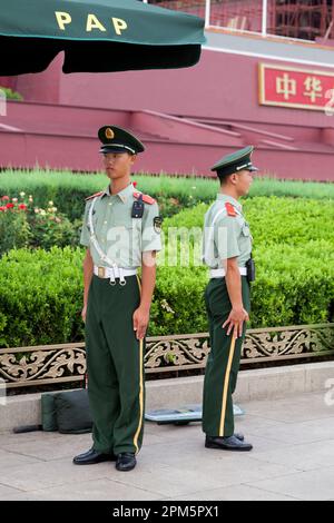 BEIJING, China - Armed police officers march in Tiananmen Square in ...