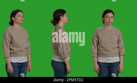 Discontent upset woman acting sad and discouraged posing over ...