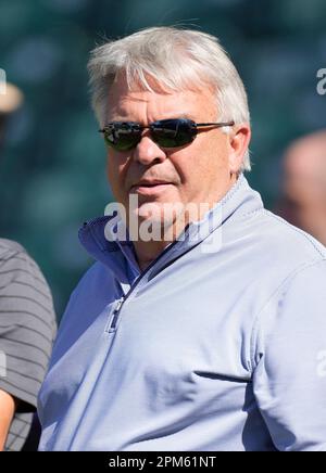 Colorado Rockies general manager Bill Schmidt look as on as players warm up before a baseball ...