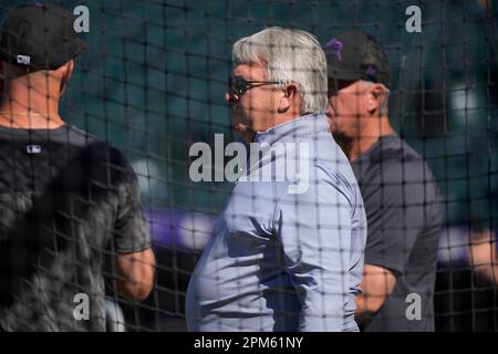 Colorado Rockies general manager Bill Schmidt look as on as players ...