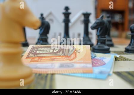 Business and finance concept. Among the financial statements and charts ...