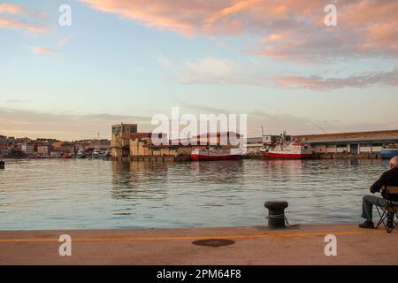 sunset lights in the port of Burela in the Cantabrian sea Stock Photo ...
