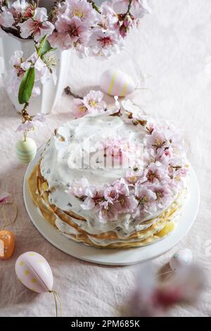 crepe cake or blini cake for Easter party, rose pink background, almond ...