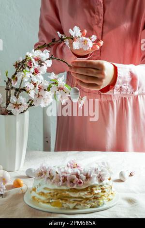 crepe cake or blini cake for Easter party, rose pink background, almond ...