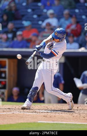 Tampa Bay Rays outfielder Ben Zobrist holds up a poster made for him ...