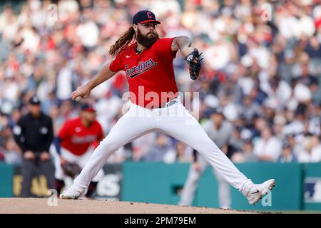 Cleveland Guardians starting pitcher Hunter Gaddis, left, is ...