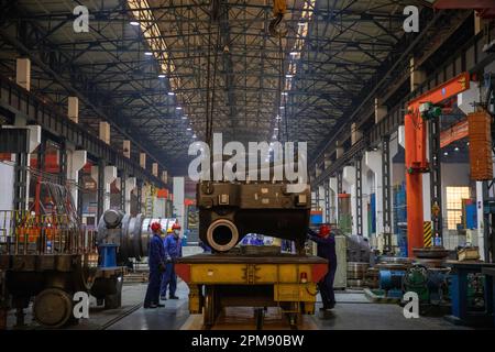 (230412) -- HARBIN, April 12, 2023 (Xinhua) -- Workers perform ...