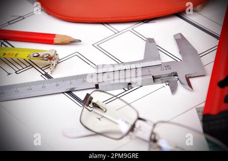 measuring instruments, pencil and caliper on table Stock Photo - Alamy