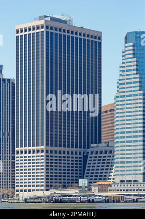 The sloping façade of 55 Water Street’s North Building crosses plane of ...