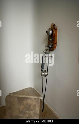 An early type of telephone in Spain Stock Photo - Alamy