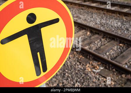 No passage sign on train platform with rails in background Stock Photo ...