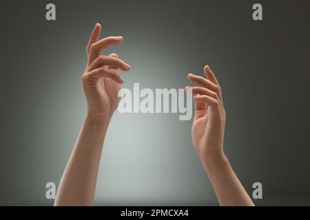 Women's palms upward with relaxed fingers in a dance gesture Stock ...