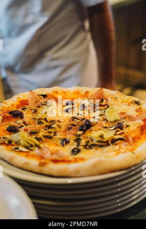 Homemade Italian-style pizza. Freshly kneaded dough, hand crushed ...