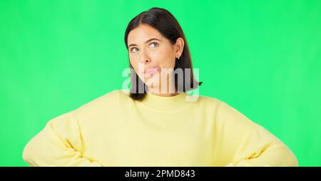Green screen, funny face expression and happy woman posing with tongue ...