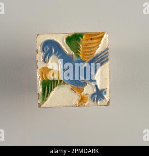 This 16th-century glazed earthenware tile features a dove, executed in ...
