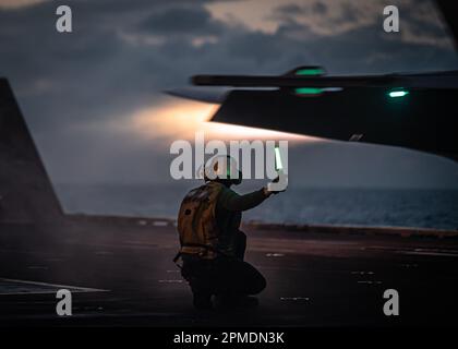 230410-N-XK462-3099 PHILIPPINE SEA (April 10, 2023) A U.S. Navy Sailor ...