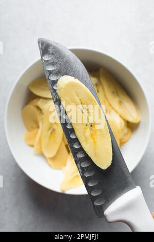 sweet ripe plantain bananas on rustic table Stock Photo - Alamy