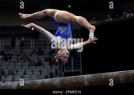 Riley McCusker competes on the beam during the senior women's ...