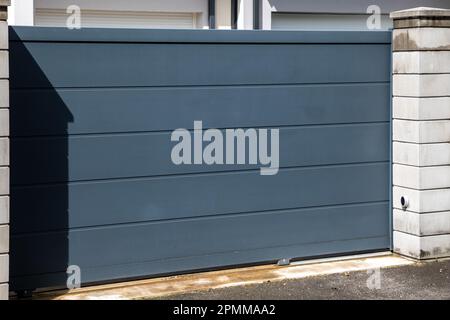 sliding gray gate steel big grey metal portal fence on modern house ...