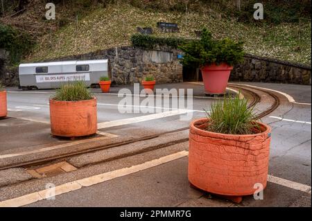 Bex, Vaud Canton, Switzerland - 8 April 2023: Rails and entrance to Bex ...
