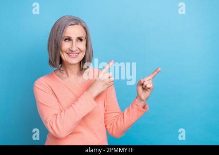 Photo of attractive smiling promoter lady wear purple knit sweater ...