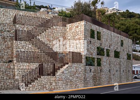 Stone wall background Decorated with trees Stock Photo - Alamy