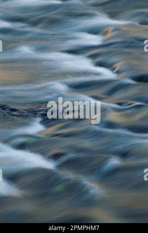 Time lapse photograph of rushing water being pushed out of the doors of ...