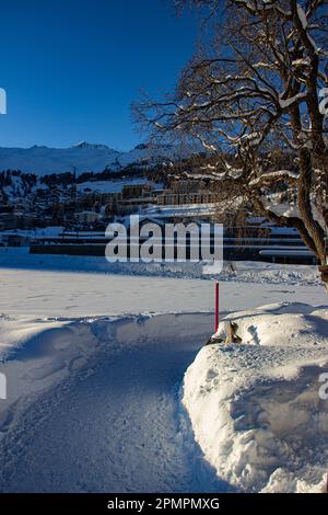 Magnificent sunset in the snowy Swiss Alps overlooking the city of St ...