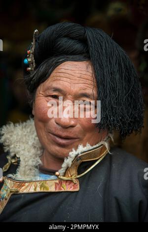 Tibetan man wearing traditional clothing, Sarnath, Uttar Pradesh, India ...