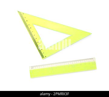 Yellow straight and triangle plastic ruler on white background Stock ...
