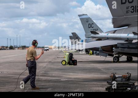 An F-16 Fighting Falcon pilot with the 121st Fighter Squadron, Andrews ...
