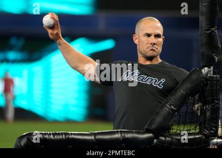 Miami Marlins manager Skip Schumaker throws batting practice before a ...