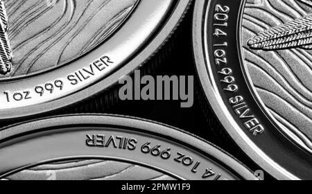 A grayscale closeup of a stack of silver coins Stock Photo - Alamy