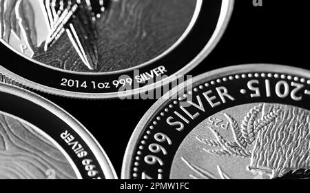 A grayscale closeup of a stack of silver coins Stock Photo - Alamy