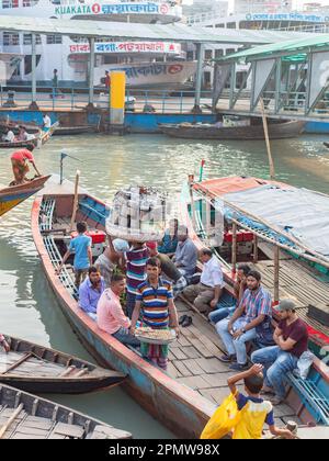 Local ferry at Wise Ghat Boat Station on Buriganga River in Dhaka, the ...