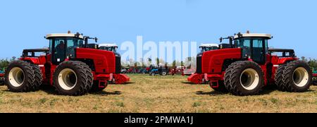 Agricultural tractors on a field. High quality photo Stock Photo - Alamy