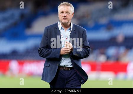 Waratahs General Manager, Andrew Blades assists in the scrum warm up ...