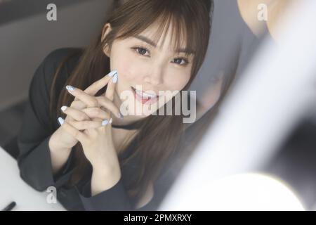 Hong Kong's first adult film actress in Japan Erena So, poses for photography at SCMPHH office ...