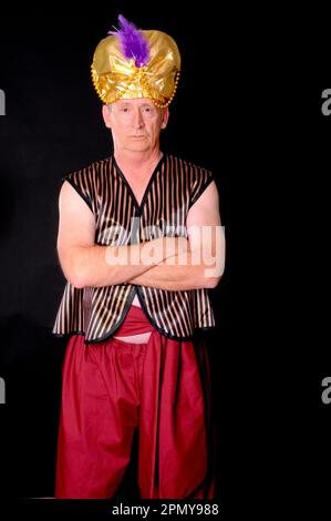 An elder sultan or sheik isolated over black Stock Photo - Alamy
