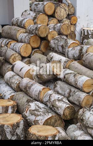 chopped wood stored by a suburban house Stock Photo - Alamy