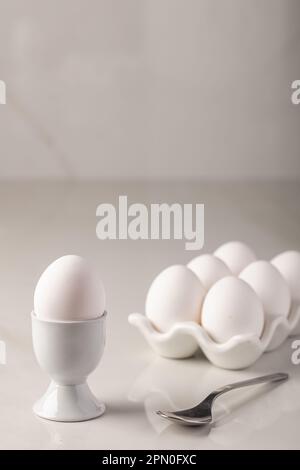 Cracked eggs pattern as white and gray background. Top view, flat lay ...