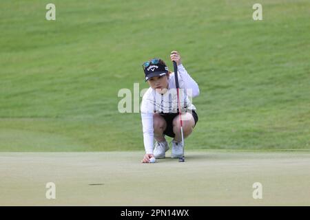 Yuna Nishimura, of Japan, putts on the seventh green during the final ...