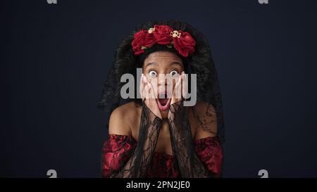 African american woman wearing katrina costume holding halloween ...