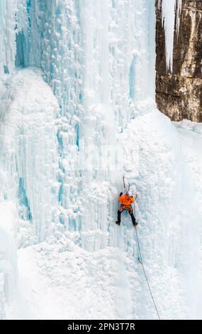 Brandon Prince climbing a route in Johnston Canyon in Canada Stock ...