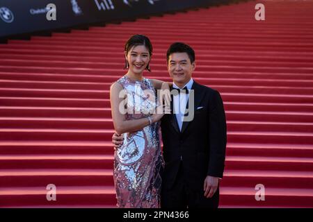 Actor Jennifer Yu, left, and her husband arrive on the red carpet for ...
