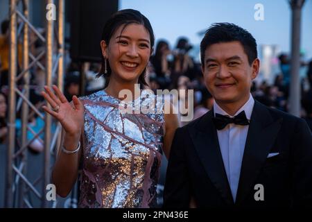 Actor Jennifer Yu, left, and her husband arrive on the red carpet for ...