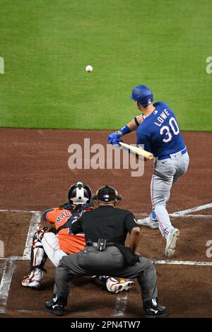 Texas Rangers first baseman Nathaniel Lowe (30) steps on first base to ...