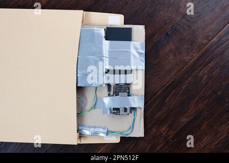 Mail bomb IED. Hand made Improvised Explosive Device with plastic ...