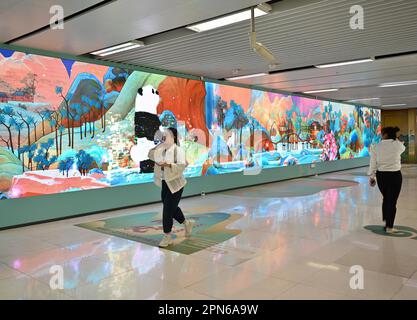 A panda appears on the interactive screen at Dongda Road Station in ...